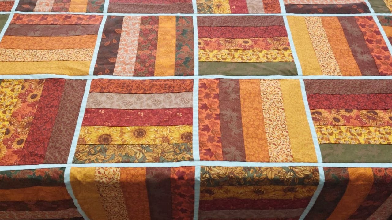 How to Make a Color Wash Quilt Using Fabric Scraps - Sew Easy by Sandy